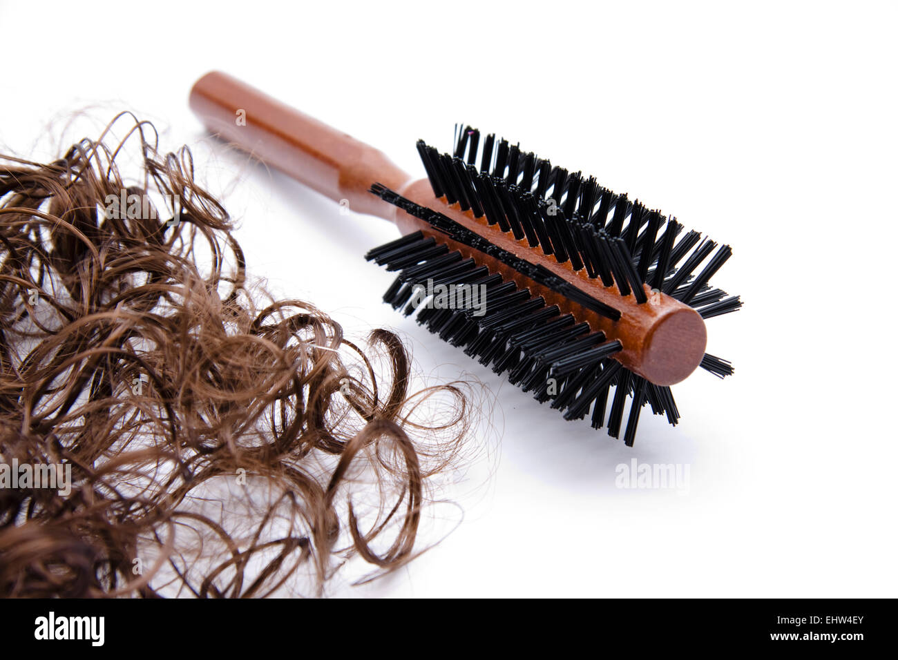Hair locks with hairbrush Stock Photo - Alamy