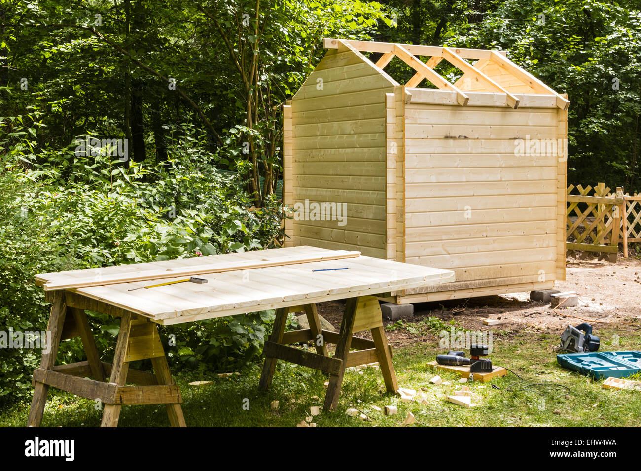 Construction of a wooden hut Stock Photo - Alamy