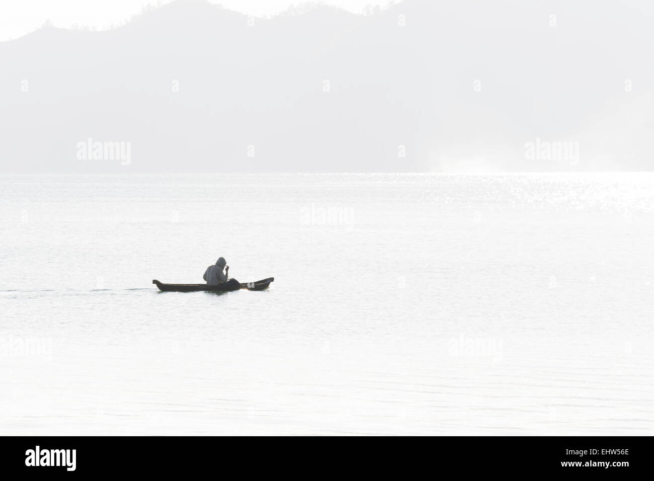 Fisherman paddle boat hi-res stock photography and images - Alamy