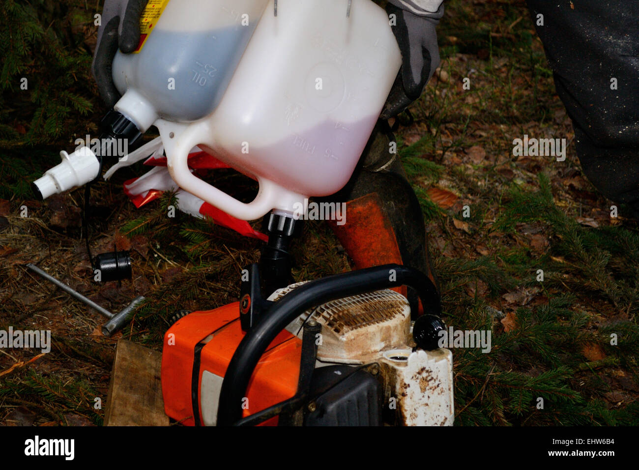When saw is refueled Stock Photo - Alamy