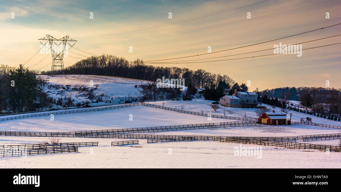 View of snow-covered farm fields and rolling hills in rural Carroll ...
