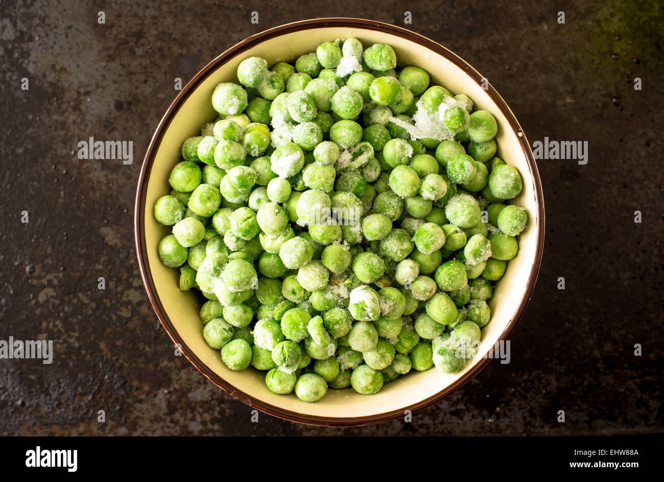 Frozen green peas with pieces of pods covered with frost Stock Photo ...