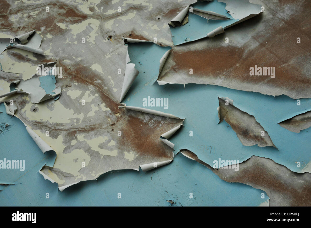 Peeling paint on weathered exterior wall of ruined building Stock Photo ...