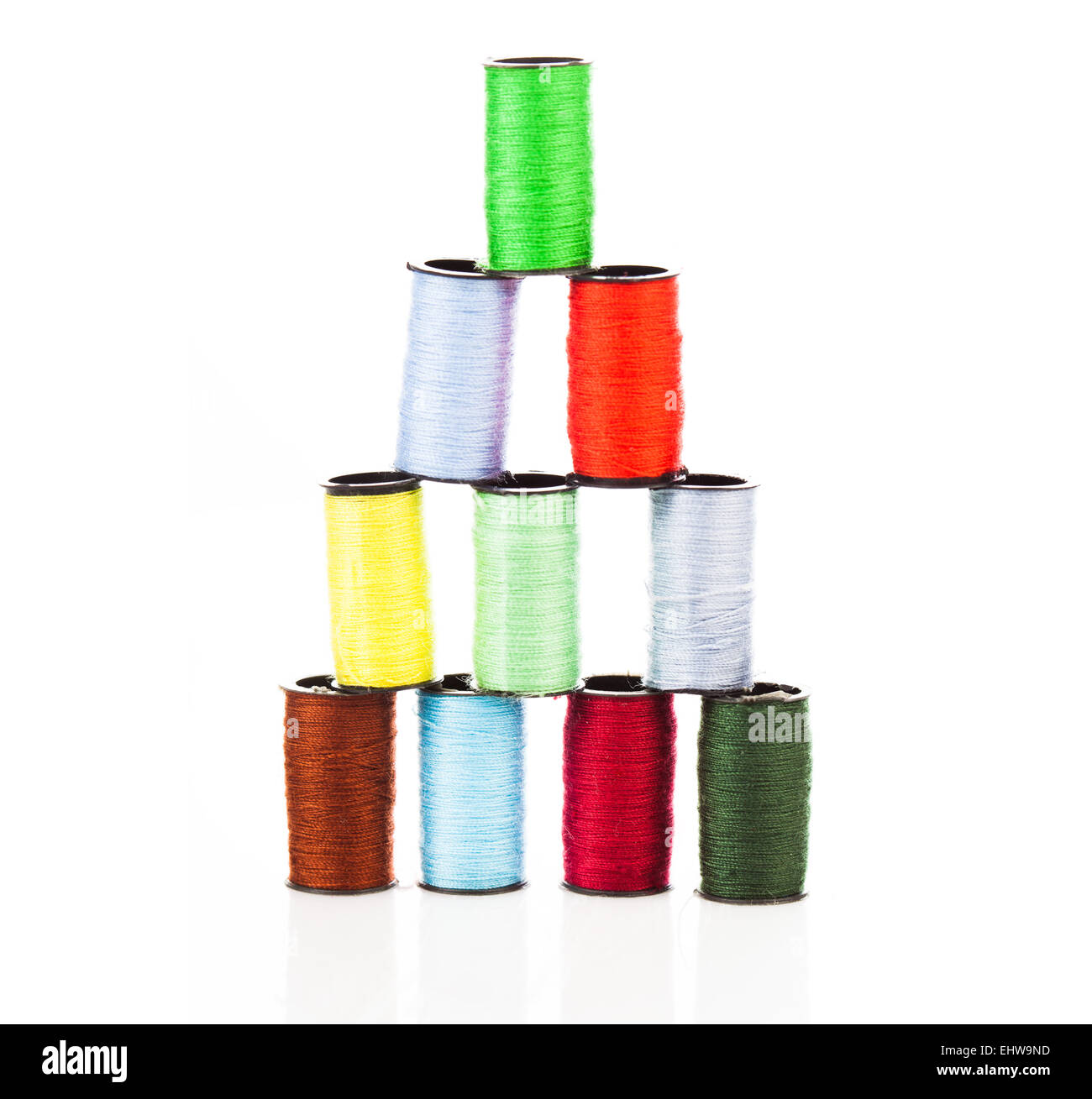 Pyramid of colourful cotton yarns Stock Photo - Alamy