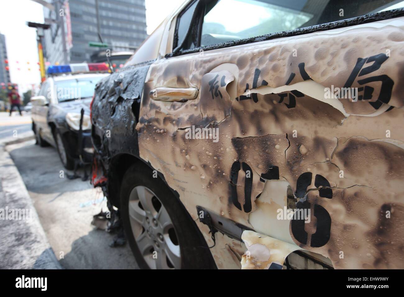 Beijing, China's Taiwan. 18th Mar, 2015. A burnt police car is seen at ...