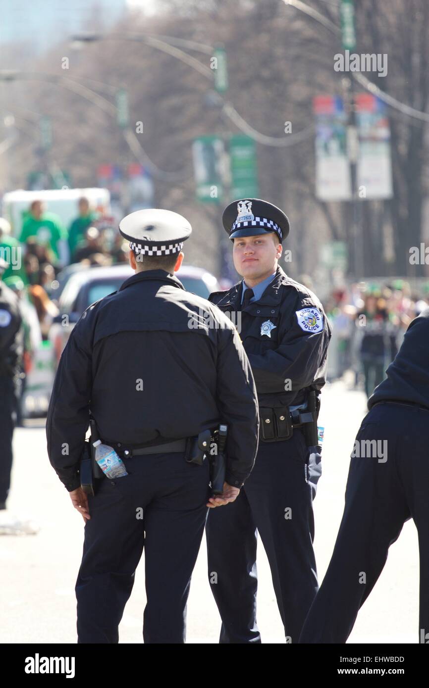 Police officers having a chat during the St. Patrick's parade Stock ...