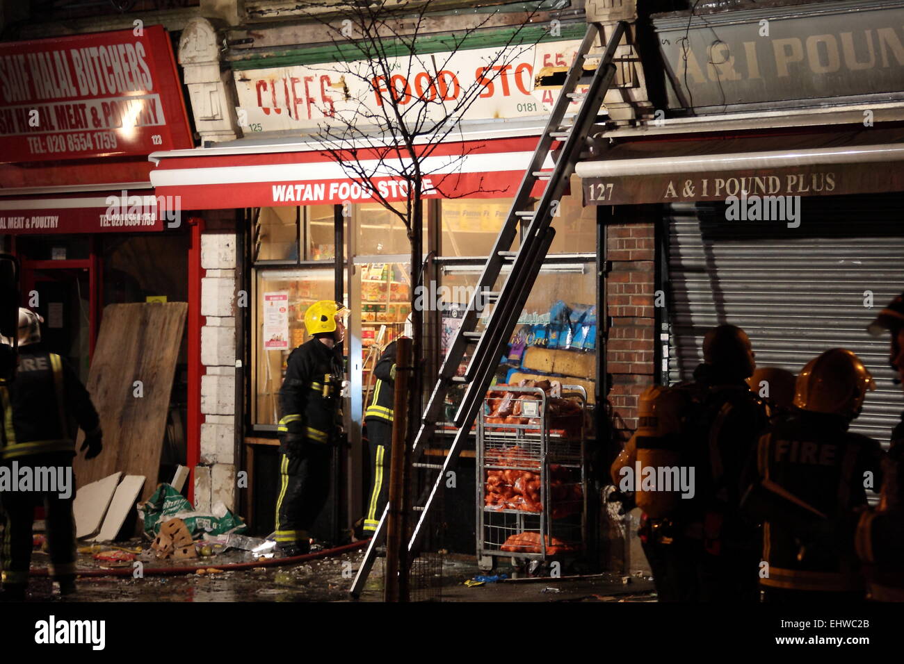 Firefighters using ladders hi-res stock photography and images - Alamy