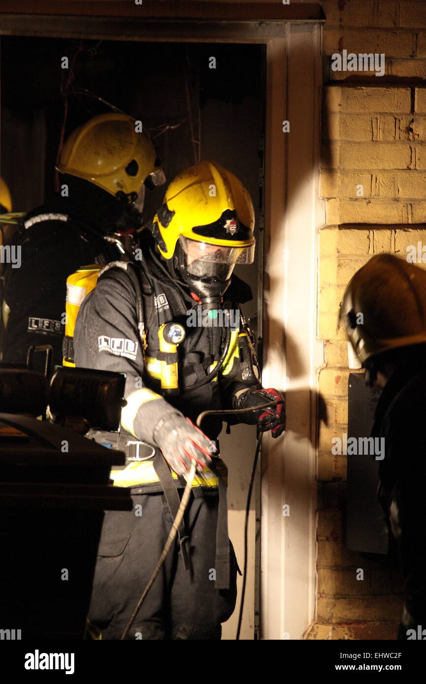 Firefighters using ladders hi-res stock photography and images - Alamy