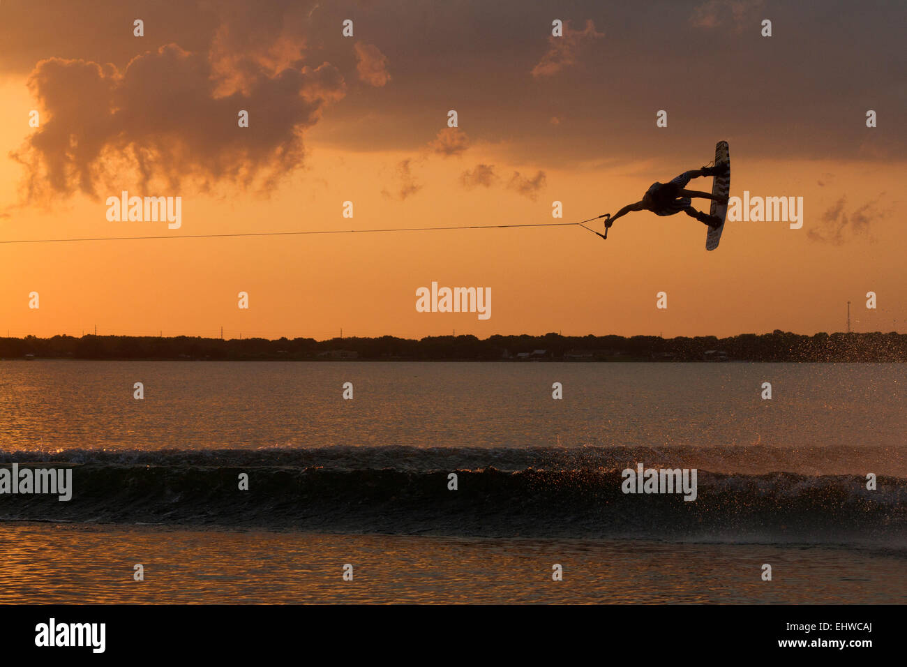 Wakeboarding at sunset Stock Photo - Alamy
