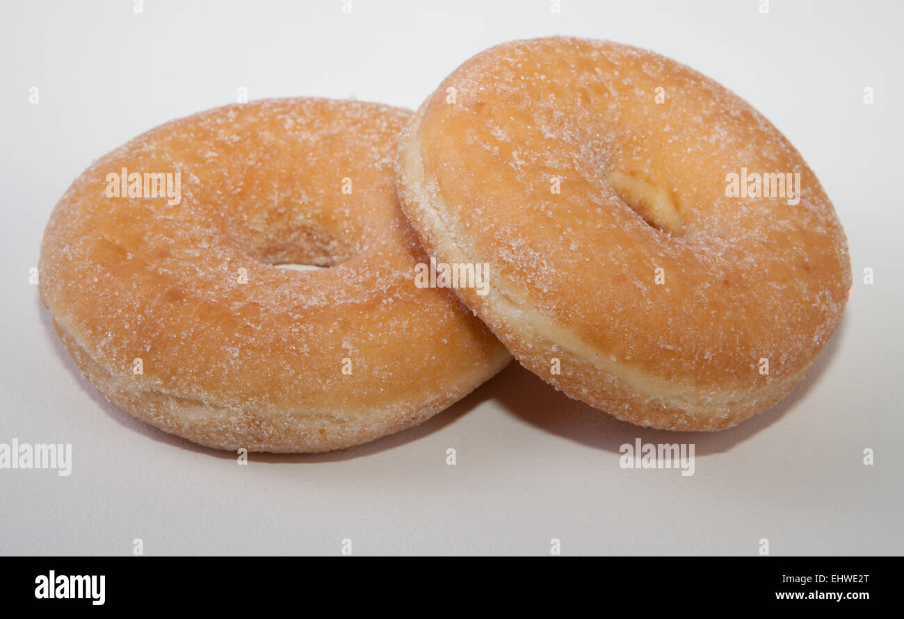 White homemade donuts. Isolated over white background Stock Photo - Alamy