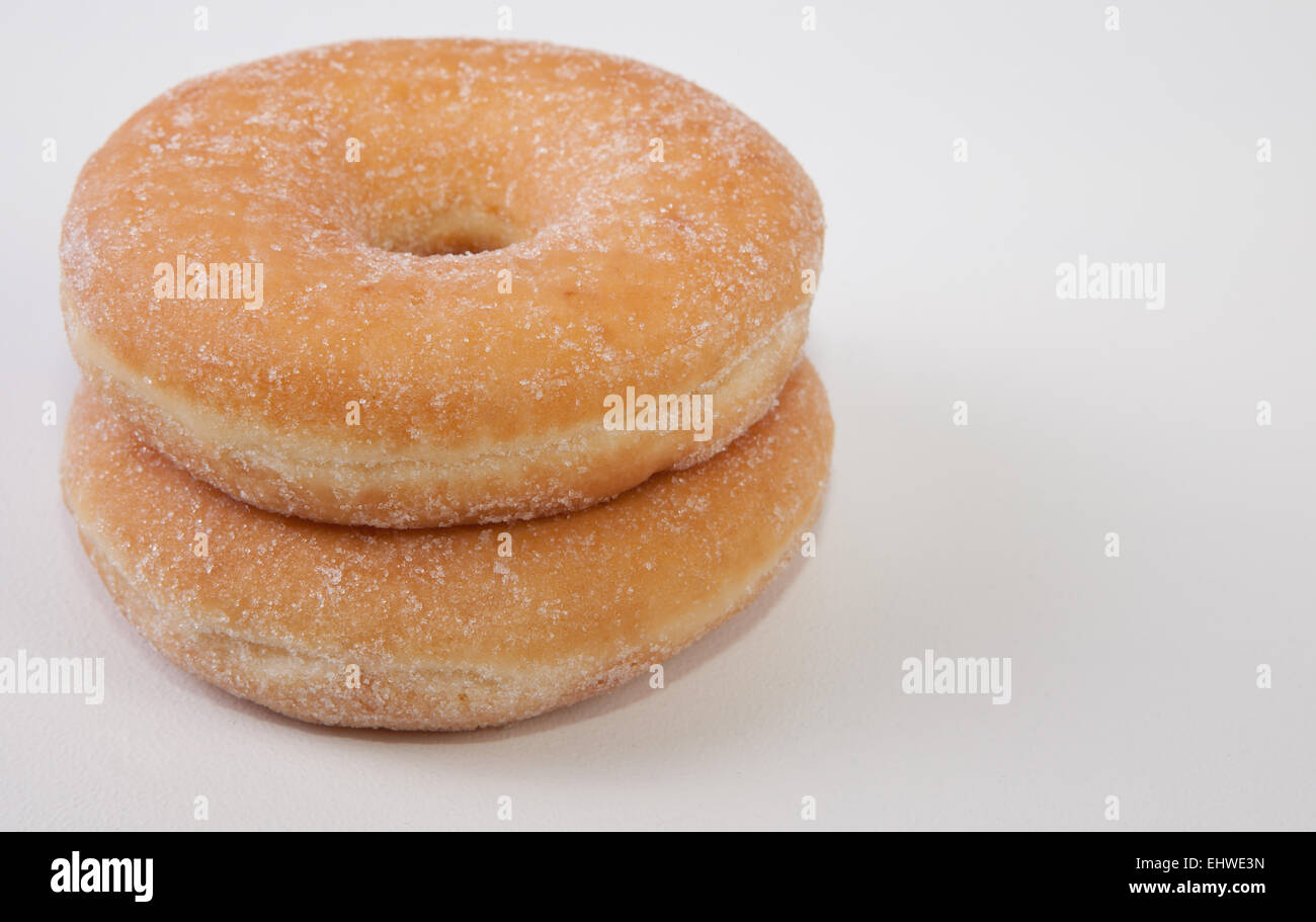 White homemade donuts. Isolated over white background Stock Photo - Alamy