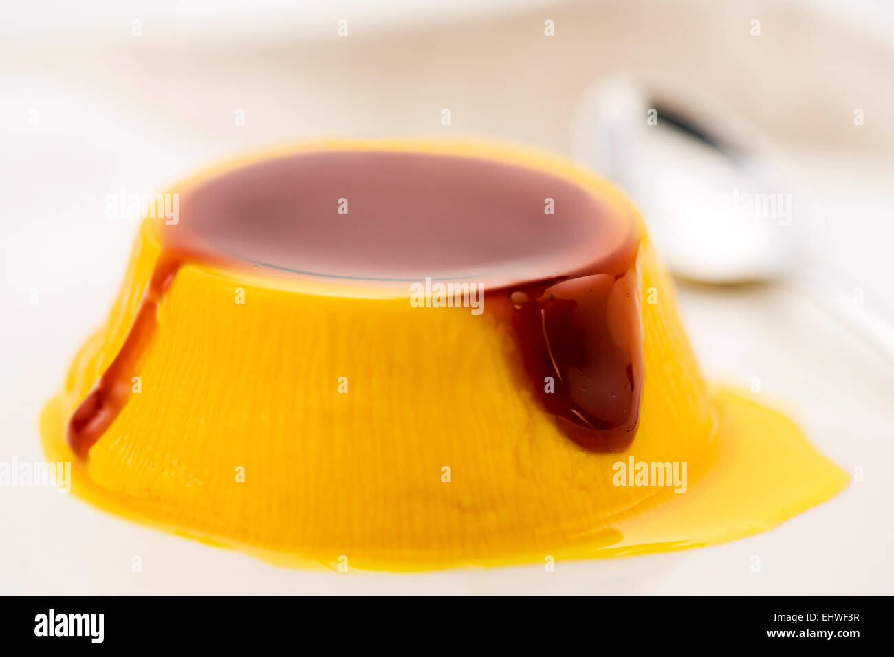 Creme caramel dessert drizzled with a tasty brown caramel sauce served ...