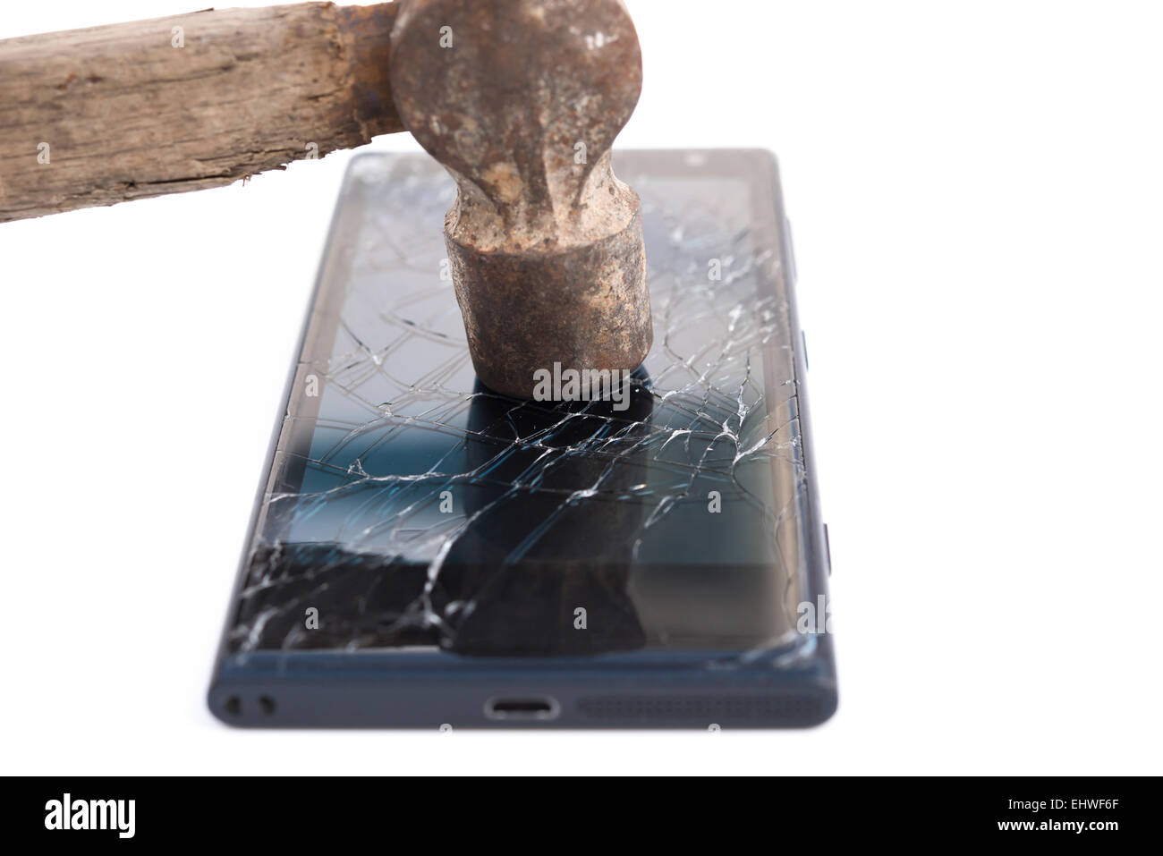 hammer hitting a mobile phone Stock Photo - Alamy