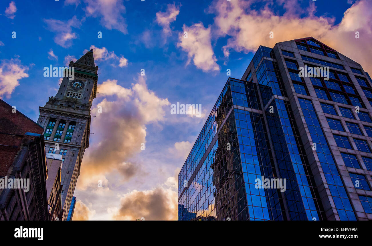Clock tower and modern buildings at sunset in Boston, Massachusetts ...