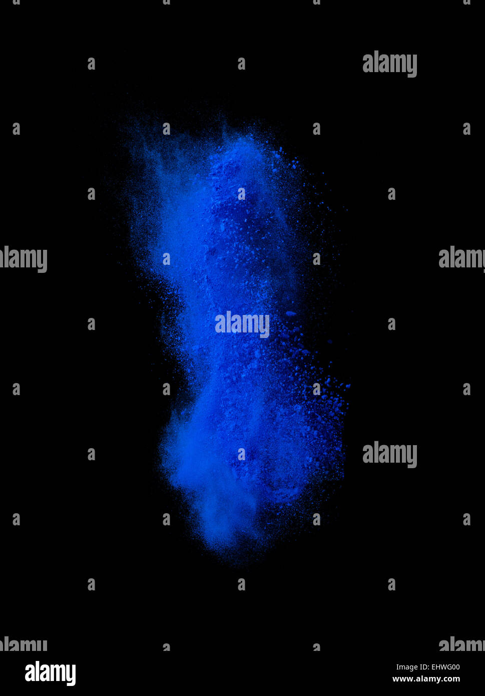 Blue powder explosion isolated on black Stock Photo - Alamy