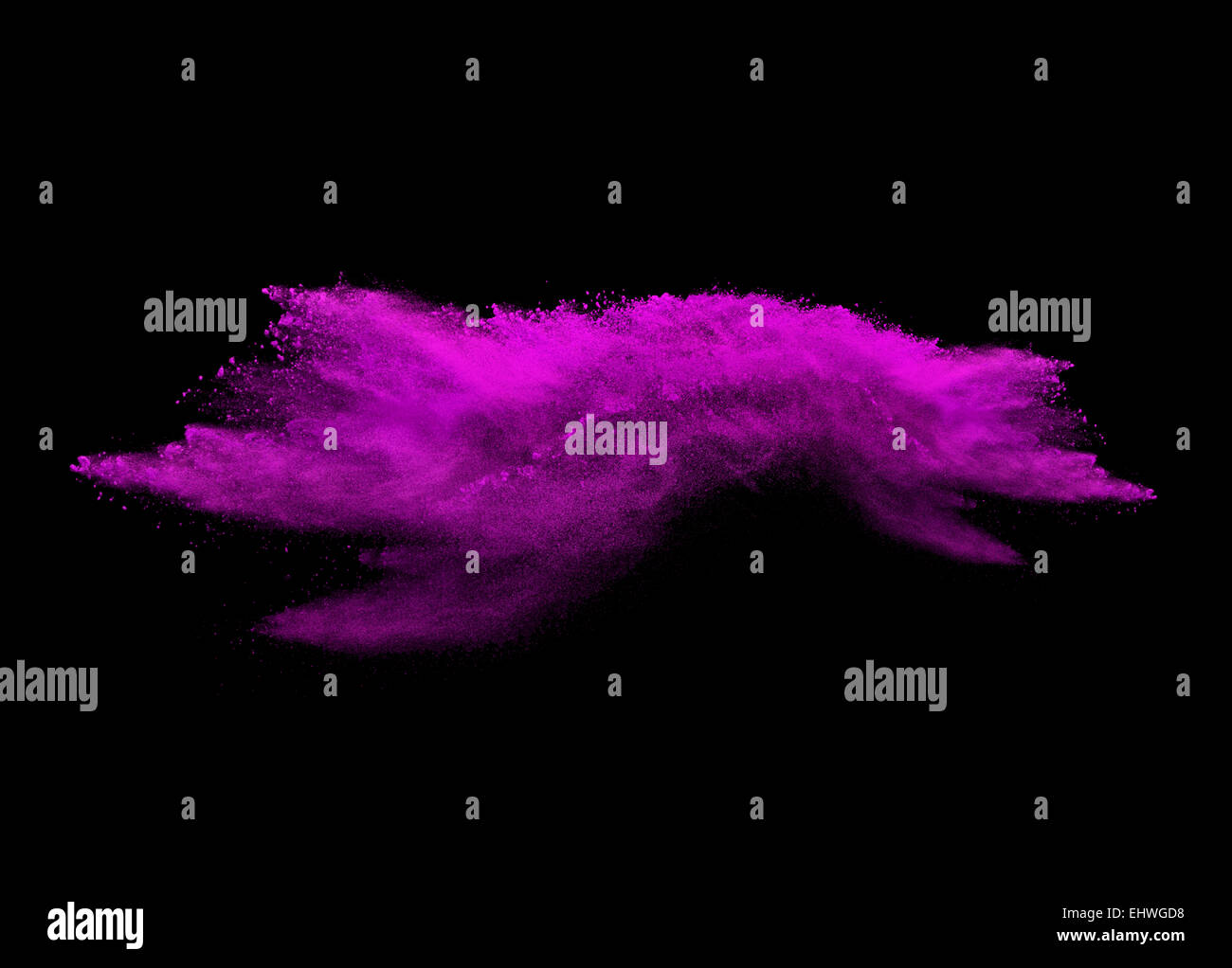 Freeze motion of pink dust explosion isolated on black Stock Photo - Alamy