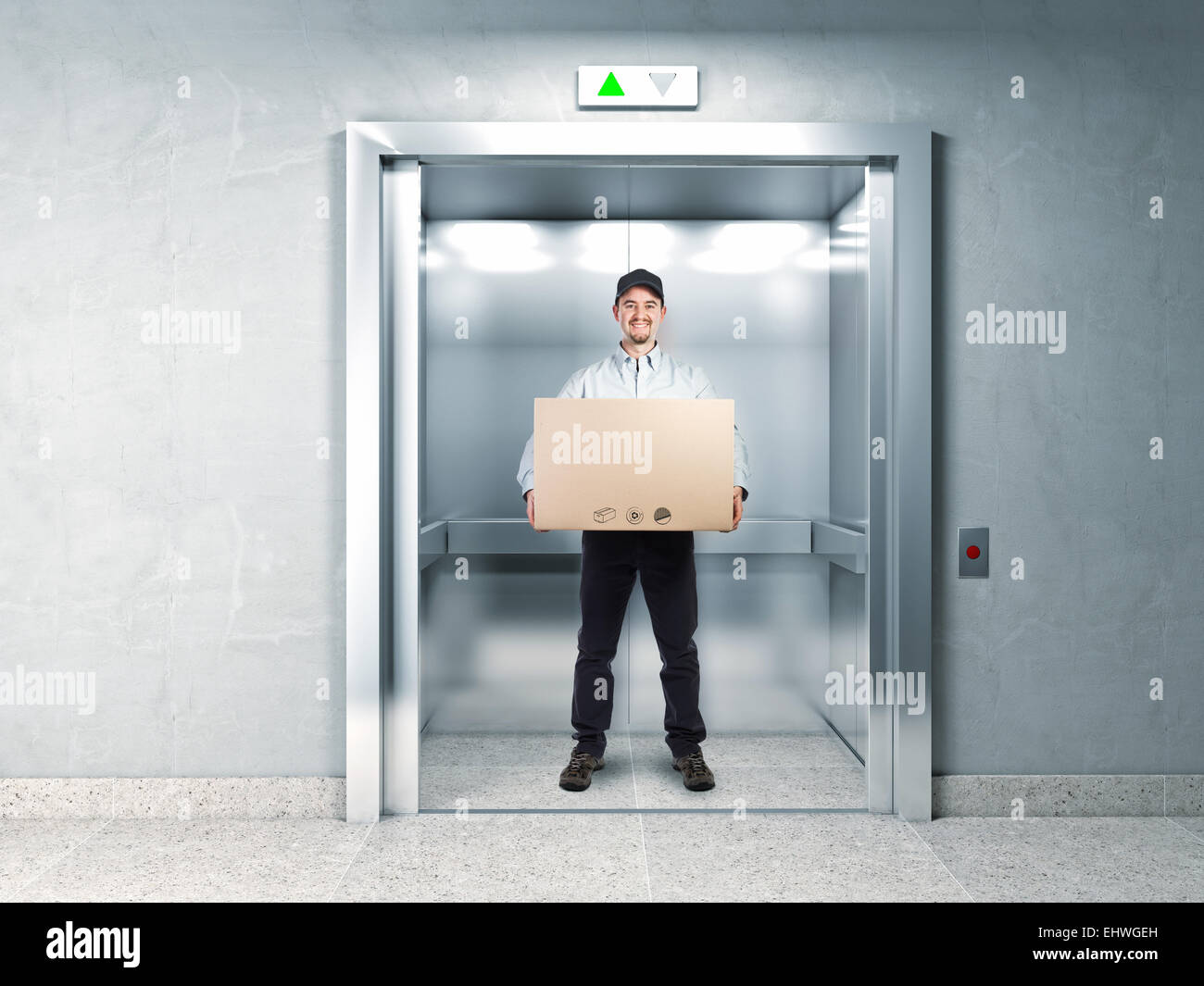 delivery man and elevator background Stock Photo - Alamy