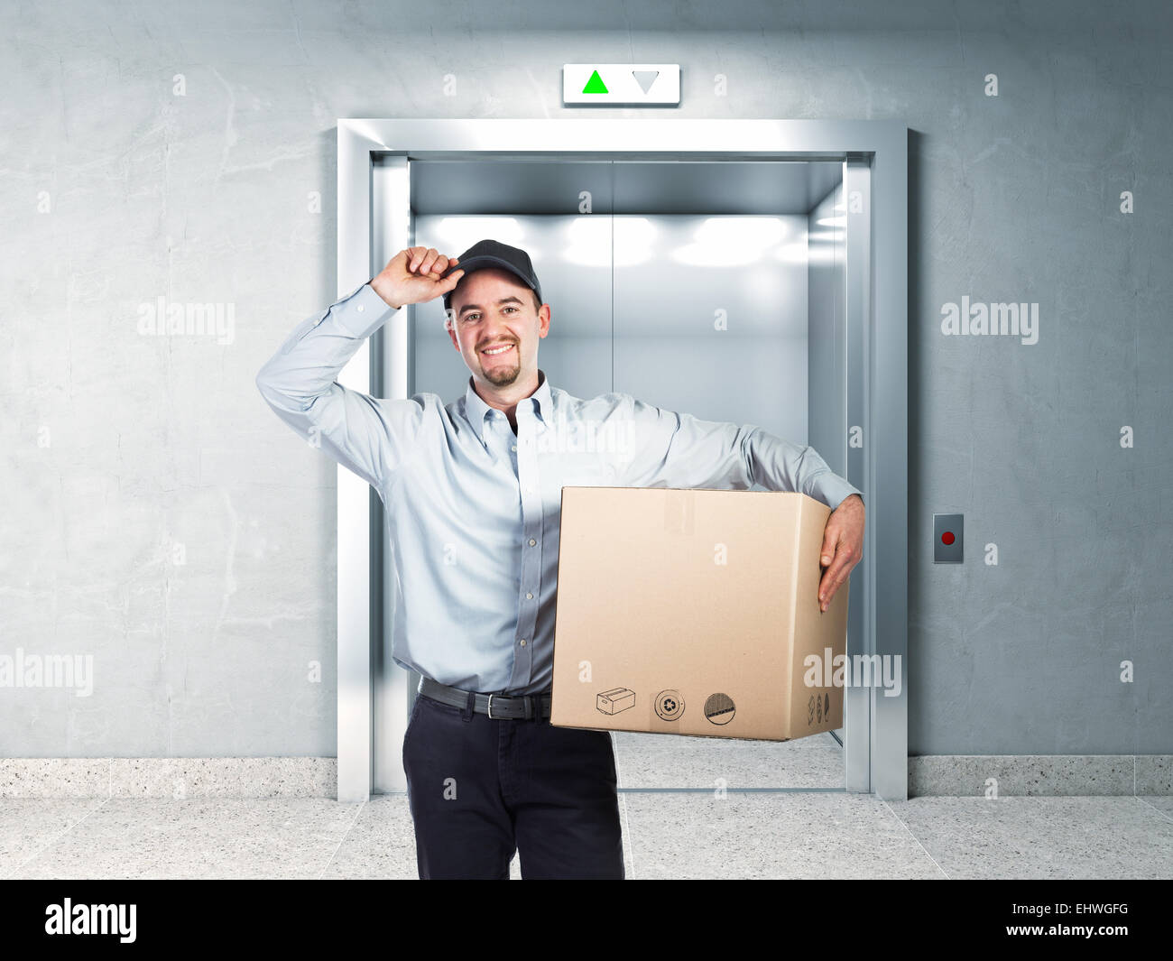 delivery man and elevator background Stock Photo - Alamy