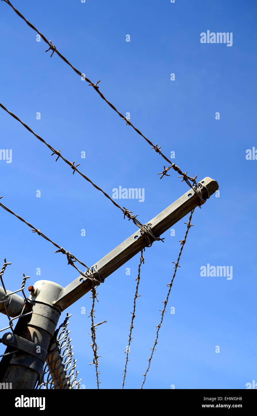 High barbed wire fence hi-res stock photography and images - Alamy