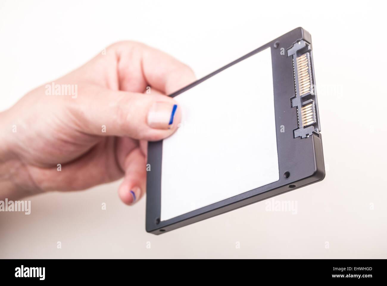 Hdd disk on female hand hi-res stock photography and images - Alamy