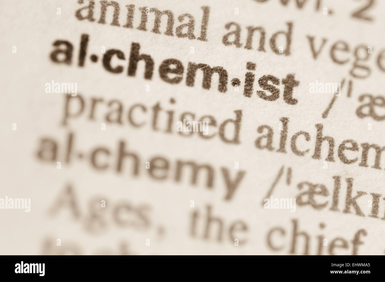 Definition of word alchemist in dictionary Stock Photo - Alamy