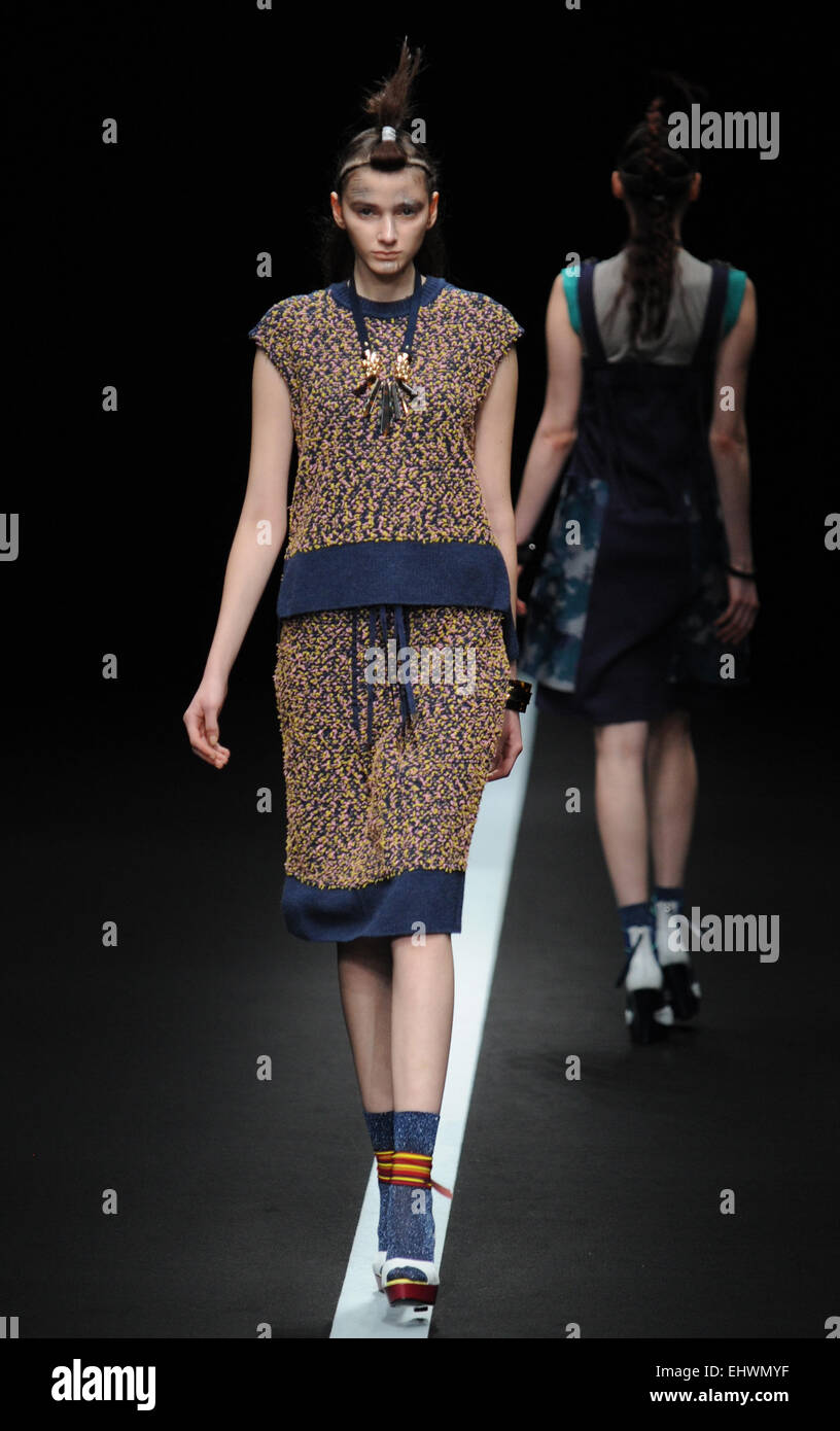 Tokyo, Japan. 18th Mar, 2015. Models display creations designed by Yuma ...