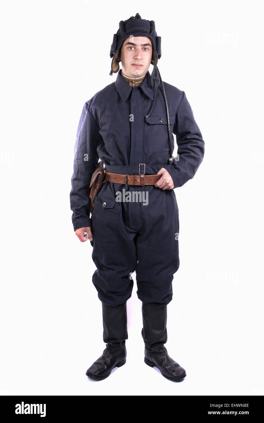 young Soviet tank driver with his gun on the white background Stock ...