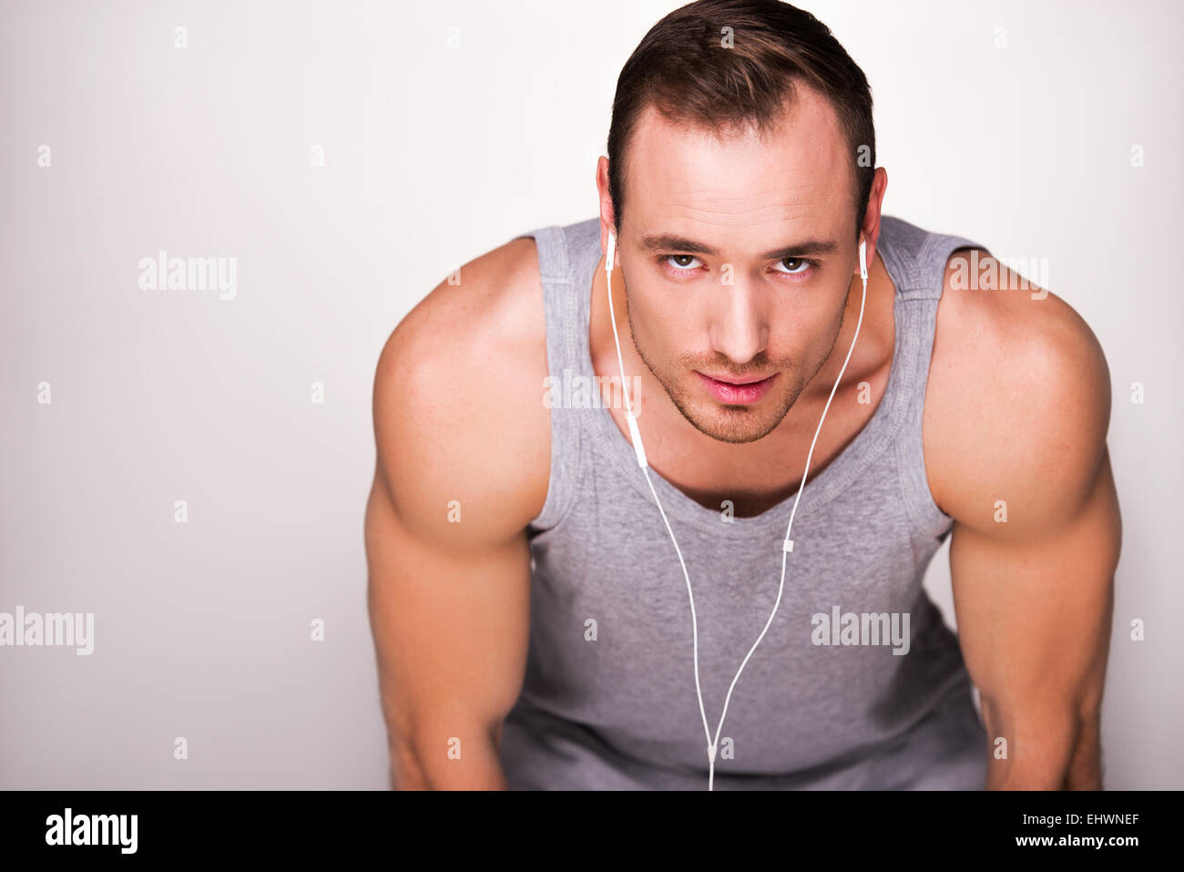 Young man resting after run Stock Photo - Alamy Young man resting after run Stock Photo - Alamy