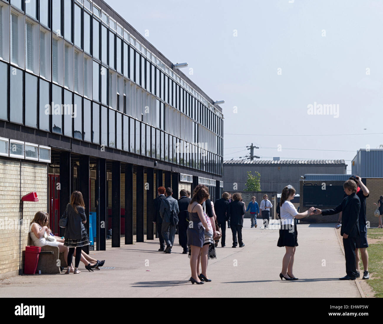 Perspective along exterior facade with students. Smithdon High School ...