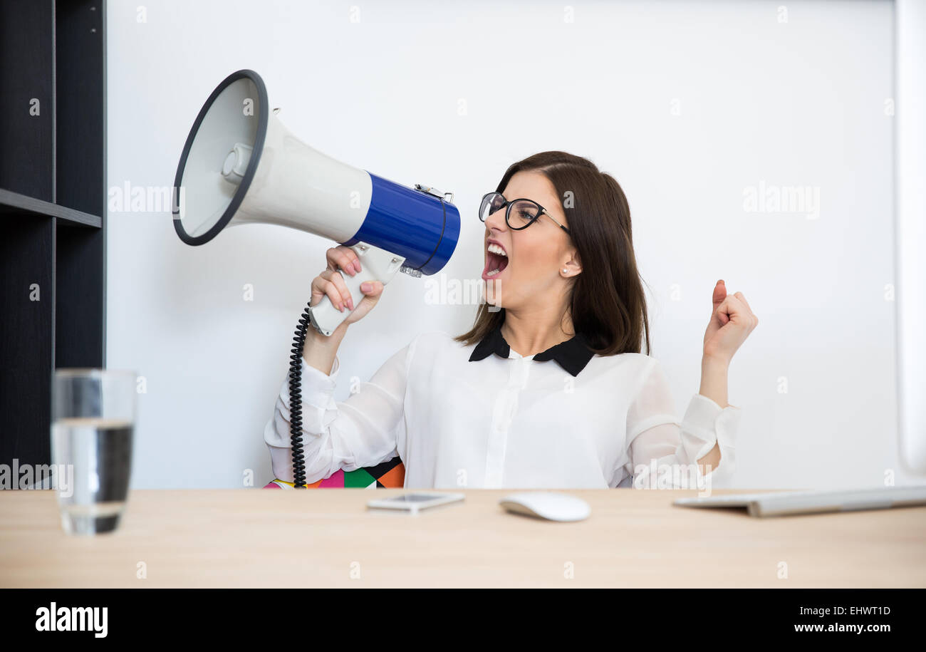 Woman megaphone office hi-res stock photography and images - Alamy