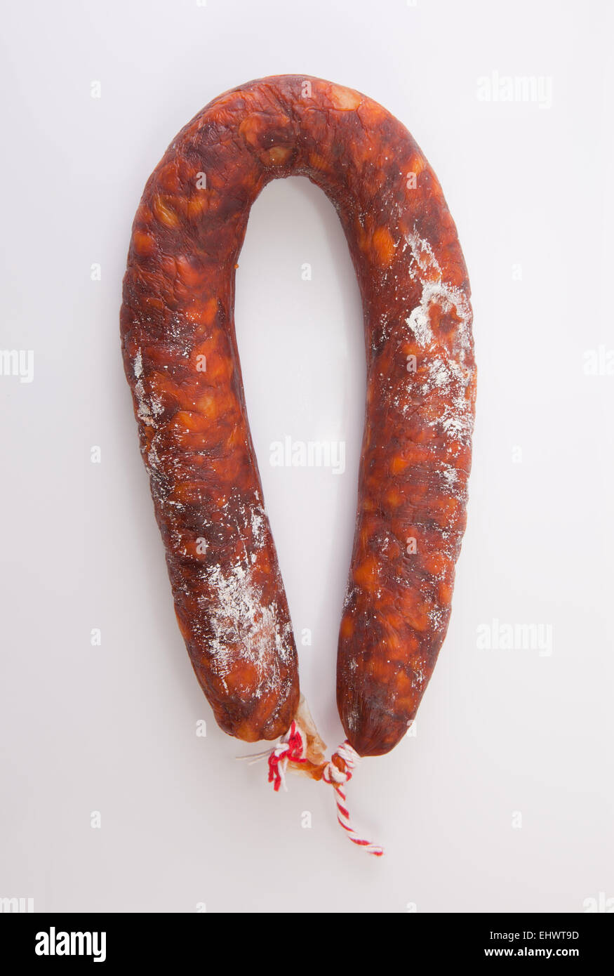 Red spanish chorizo sausage. Isolated over white background Stock Photo ...