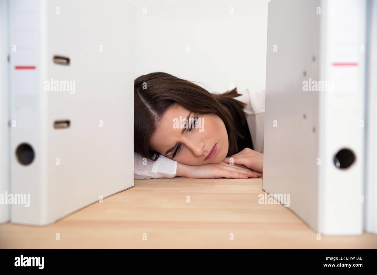 Worker leaning on table hi-res stock photography and images - Alamy