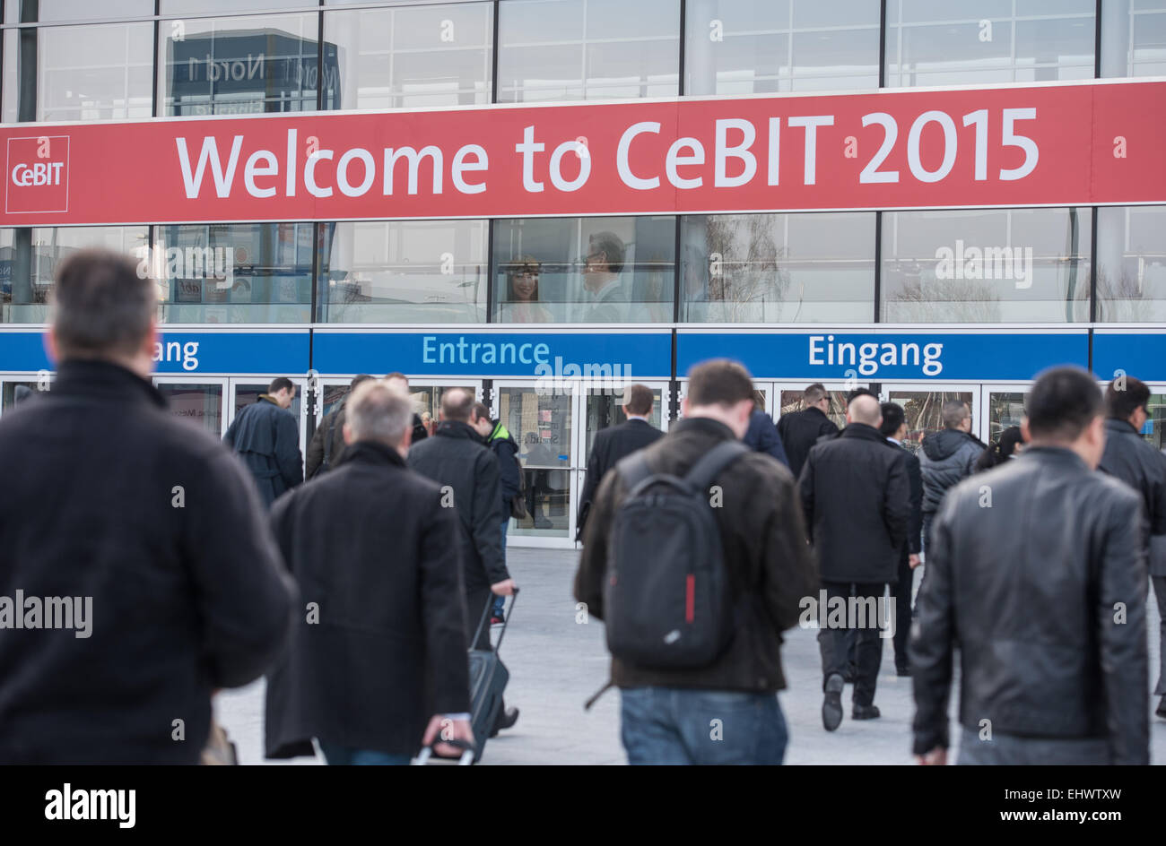 Hanover, Germany. 17th Mar, 2015. Visitors arrive at the fair halls for the computer and ...