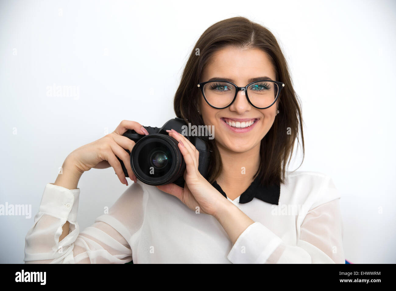 Happy casual woman smiling camera hi-res stock photography and images ...