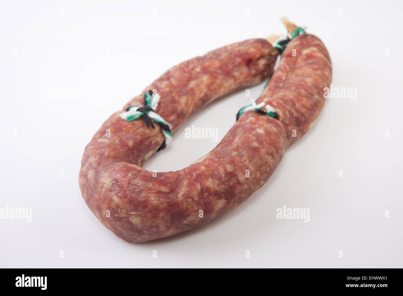 Cured spicy sausage. Isolated over with background Stock Photo - Alamy