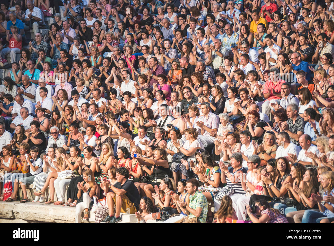 Bulgaria, excited concert audience clapping hands Stock Photo - Alamy