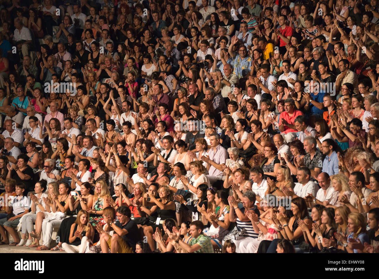 Bulgaria, excited concert audience clapping hands Stock Photo - Alamy