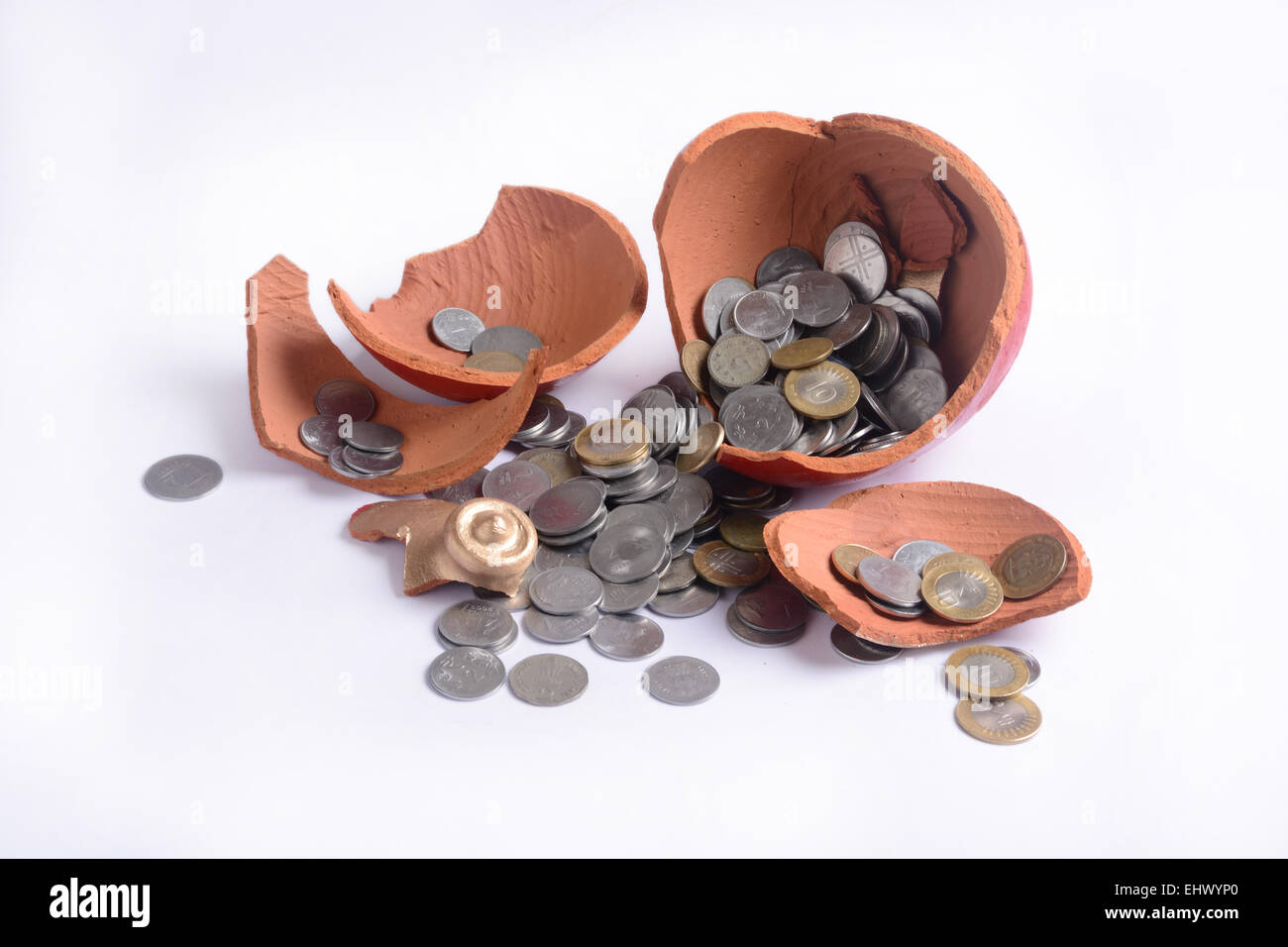 Earthen pot is a coin box of rural India called Gullak Stock Photo - Alamy