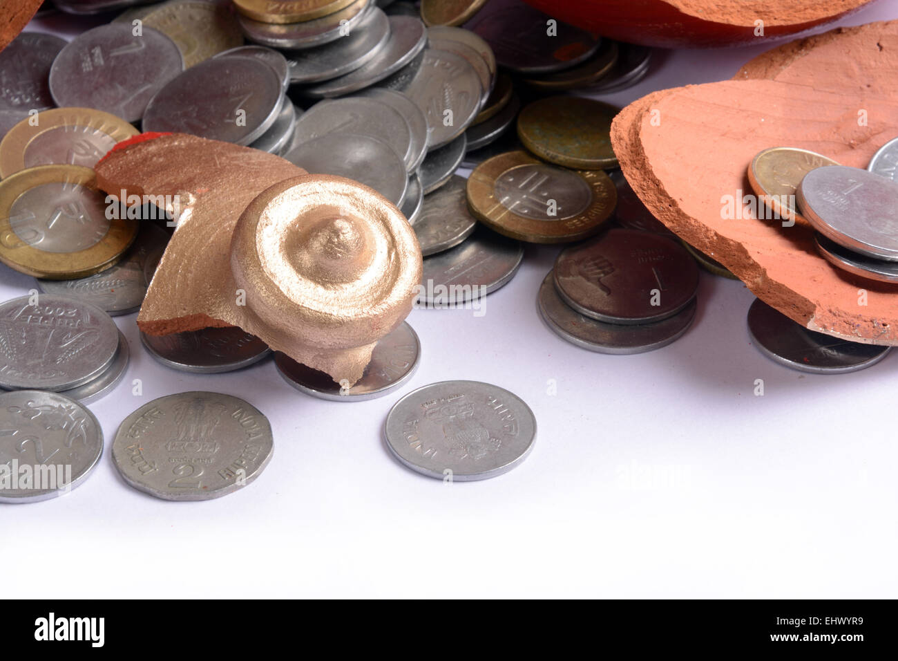 Earthen pot is a coin box of rural India called Gullak Stock Photo - Alamy