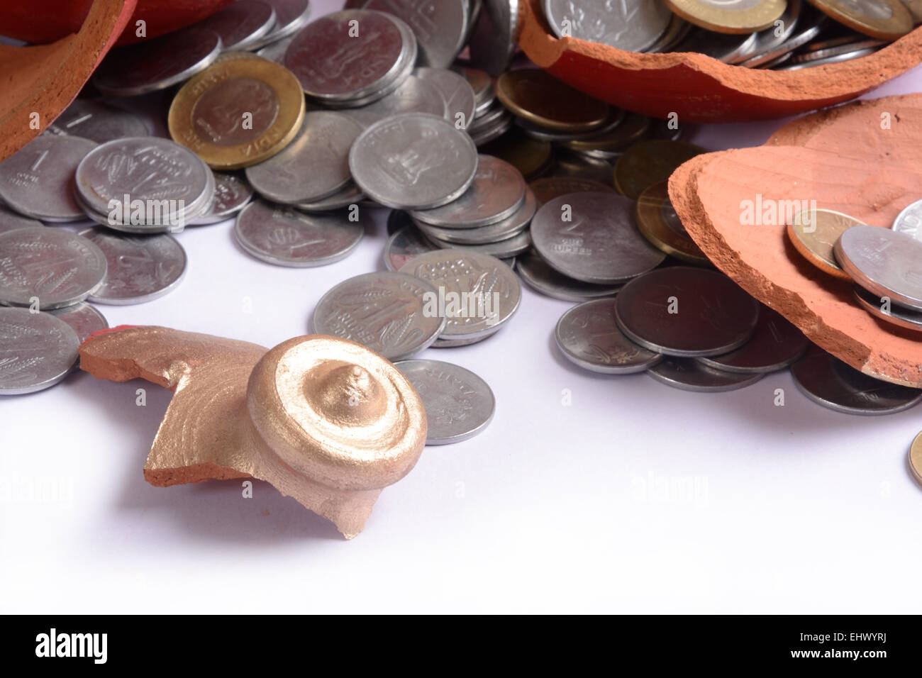Earthen pot is a coin box of rural India called Gullak Stock Photo - Alamy