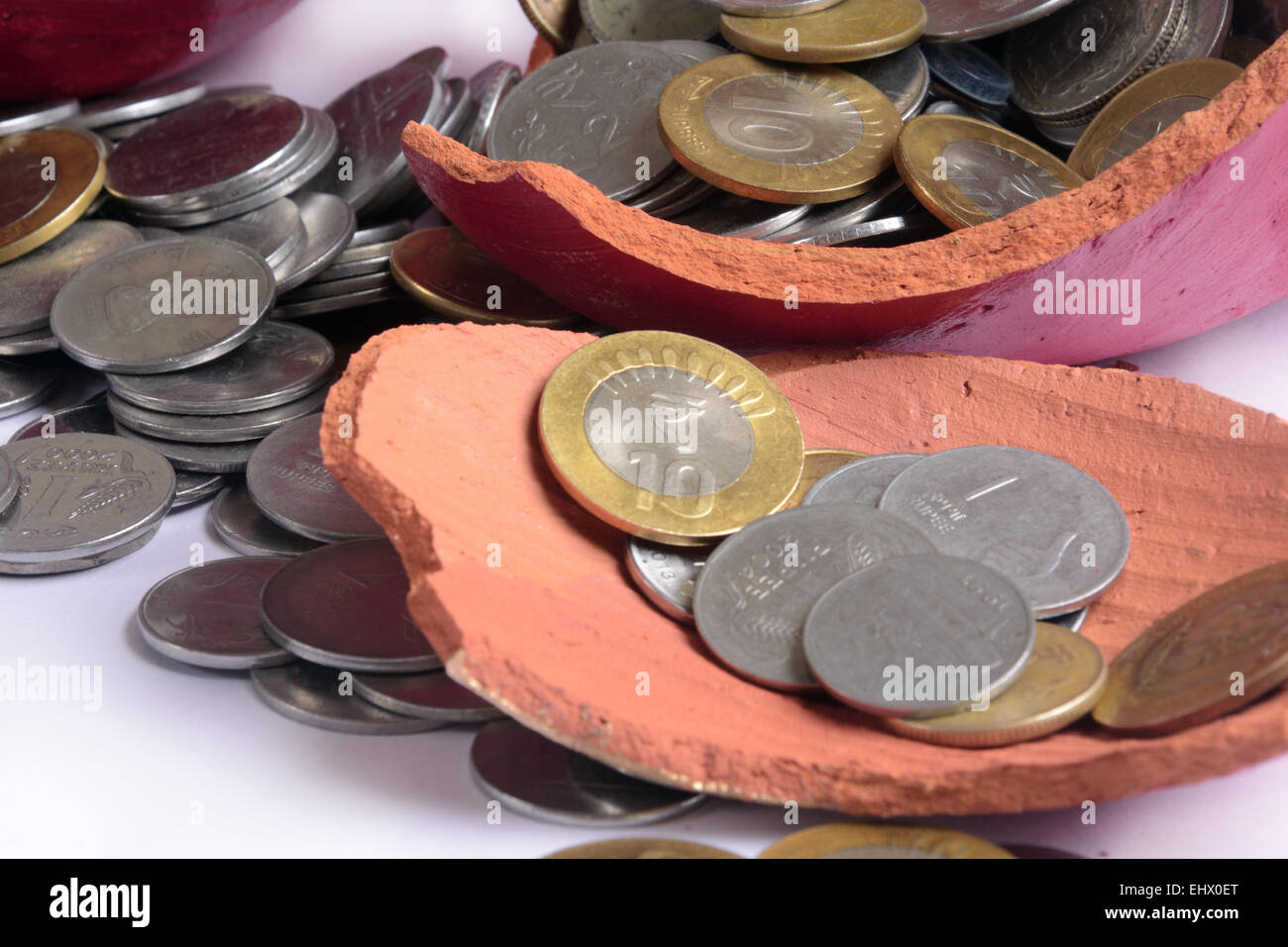 Earthen pot is a coin box of rural India called Gullak Stock Photo - Alamy