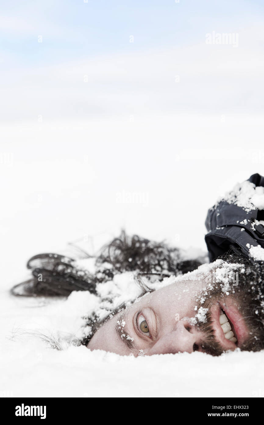 Male corpse in snow Stock Photo - Alamy