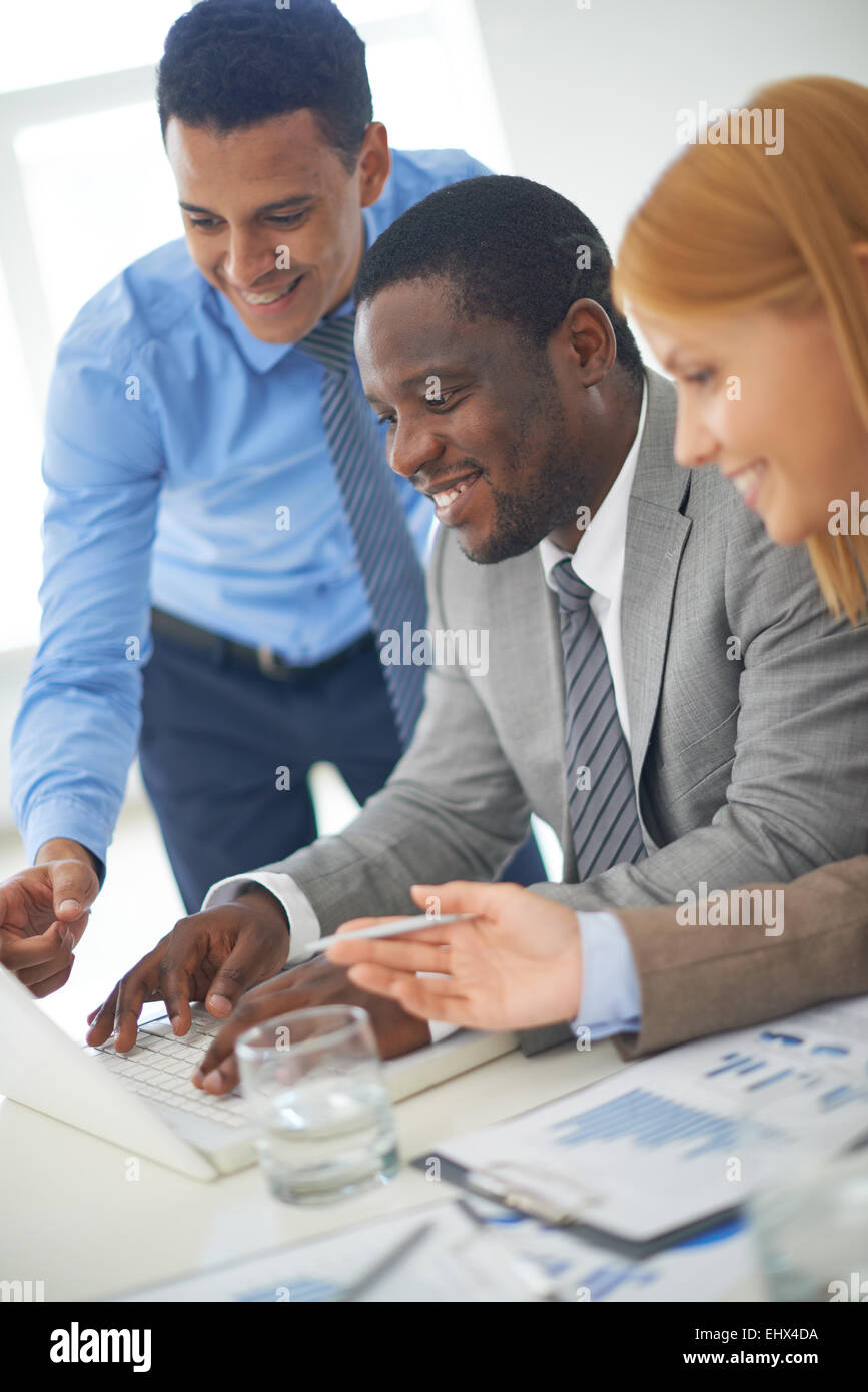 Three young multiethnic businesspeople hi-res stock photography and ...