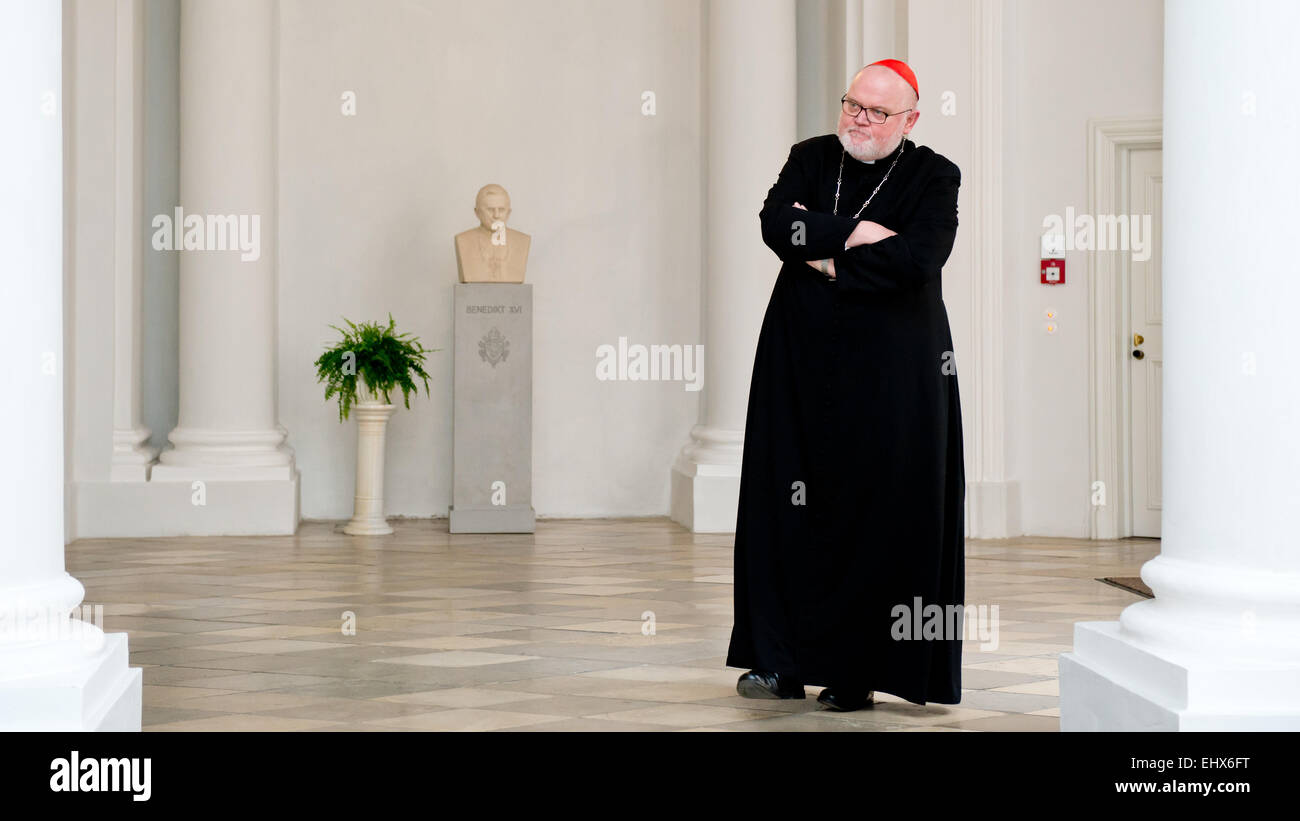 Cardinal Reinhard Marx waits for the arrival of the Bavarian Premier ...