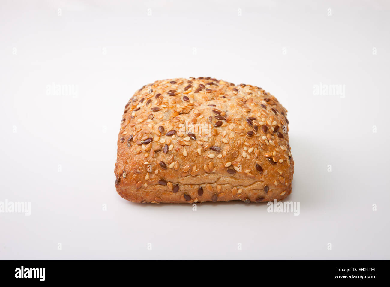 Fresh, squared wholemeal bread with sunflower seeds, sesame and others ...