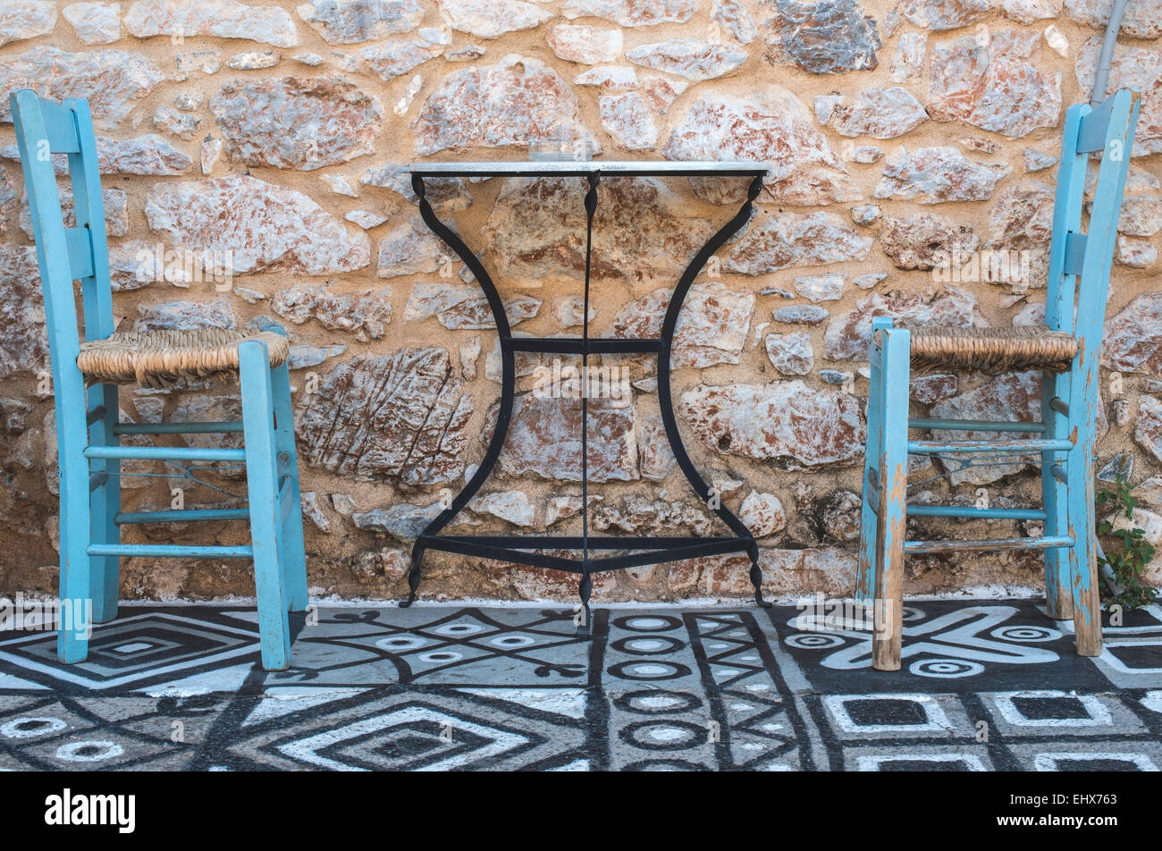 Greece, Mani, typical Greek table and two chairs in a restaurant Stock ...