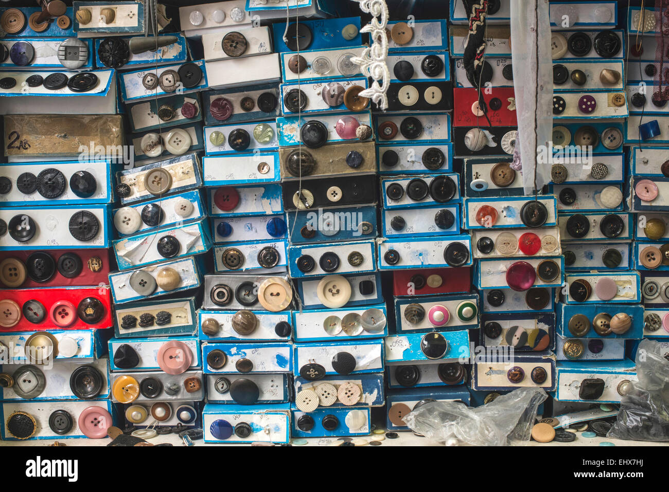 Cardboard boxes with buttons in a shop Stock Photo - Alamy