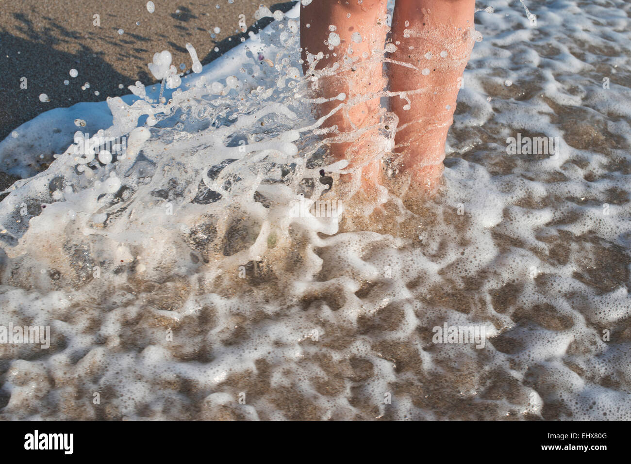 Bulgaria, feet in the waves on the beach Stock Photo - Alamy