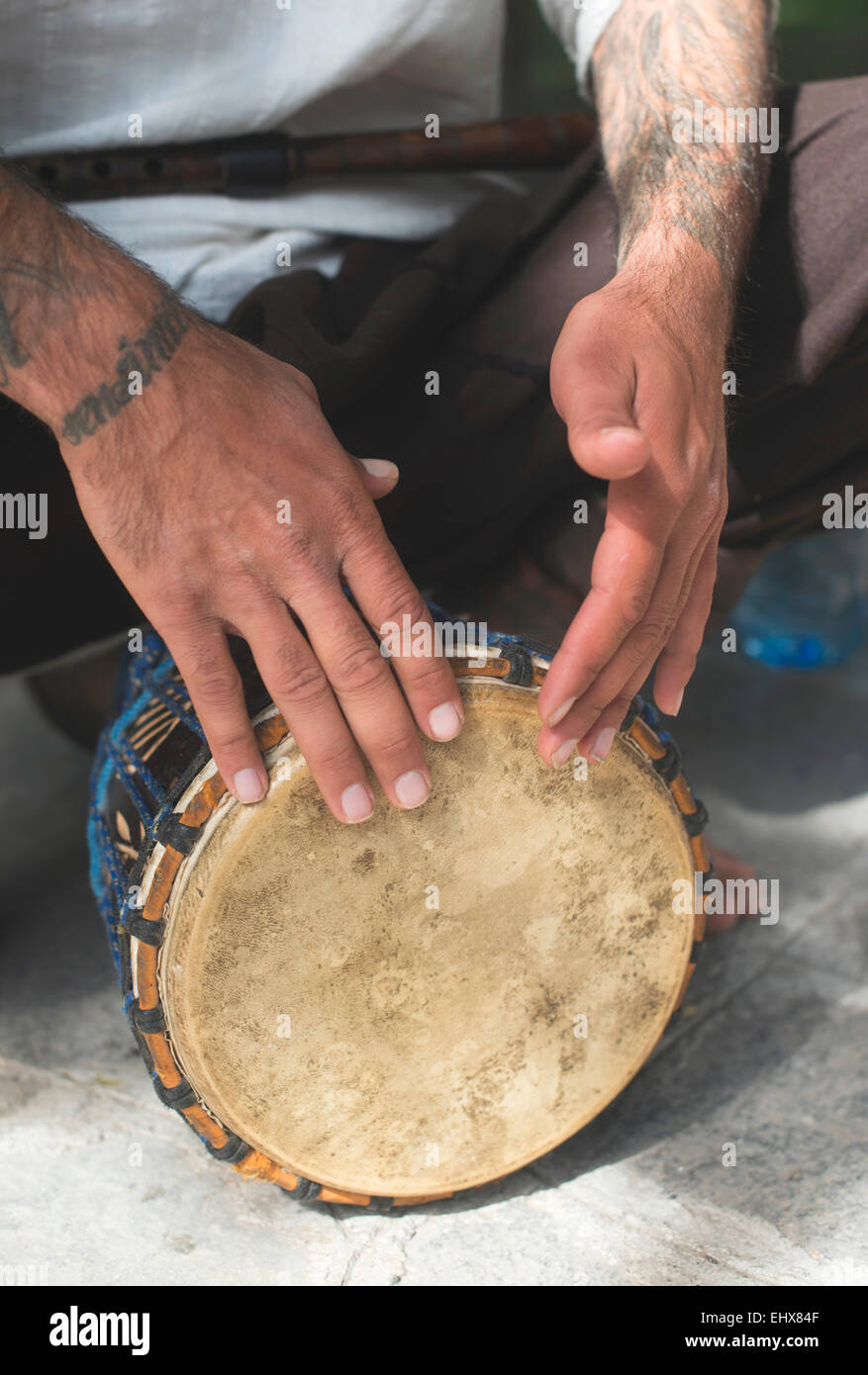 Hands of drumming street musician Stock Photo - Alamy