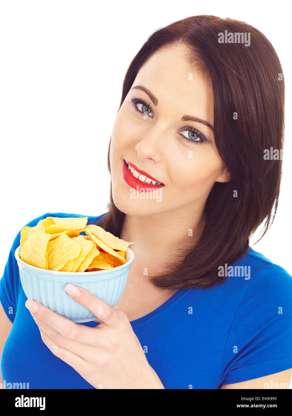 Attractive Young Woman Eating Potato Crisps Stock Photo - Alamy